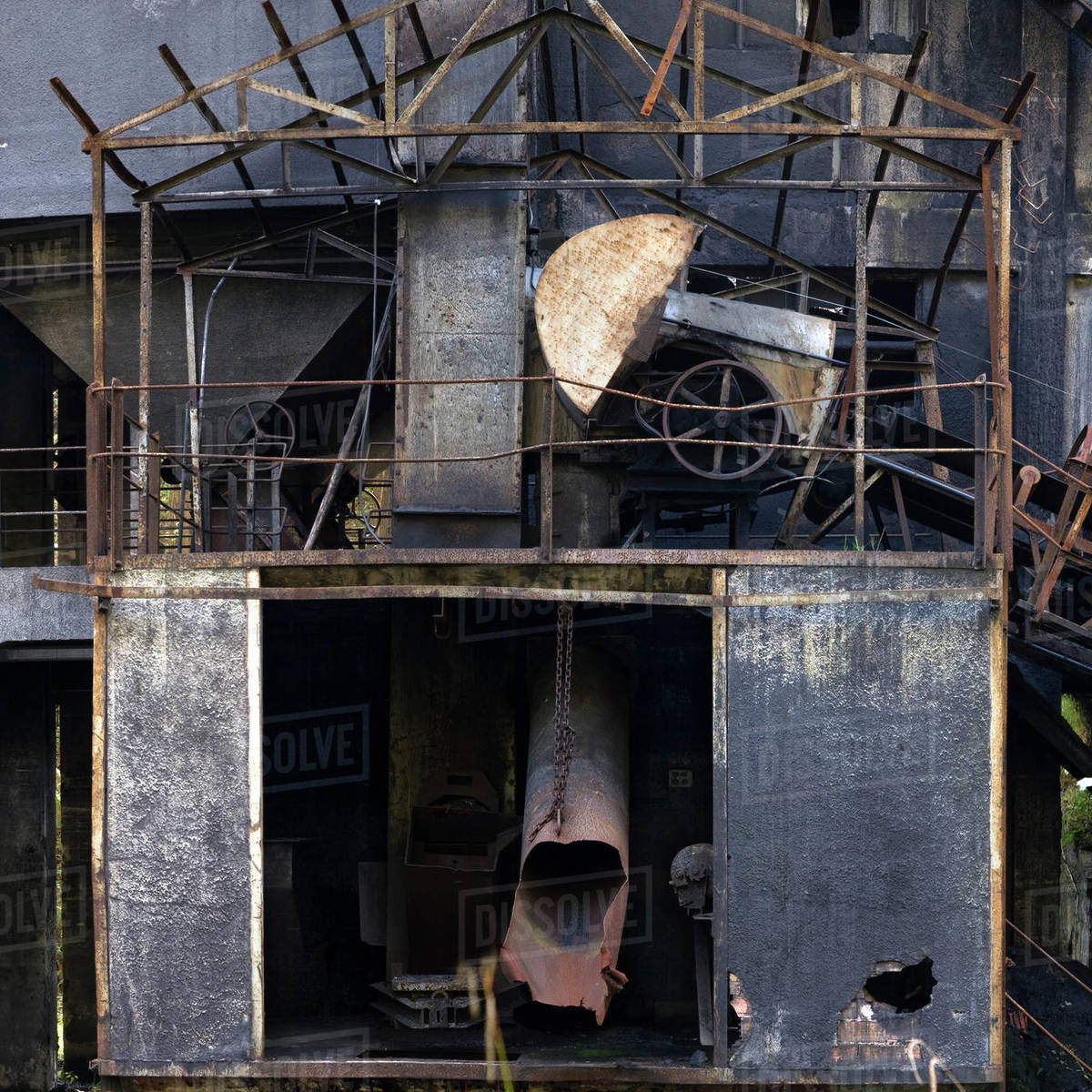 Shabby metal two level frame of structure covered with layer of rust ...