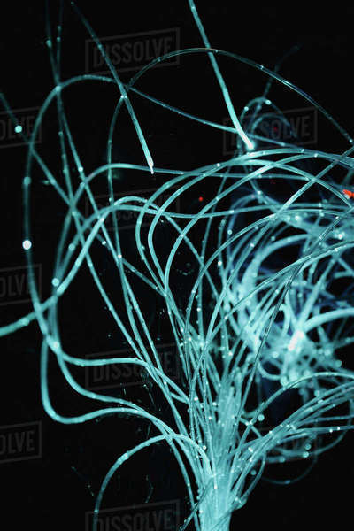 Closeup of abstract blue translucent thin wire with illumination inside ...