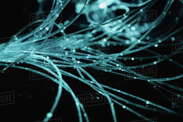 Closeup of abstract blue translucent thin wire with illumination inside ...