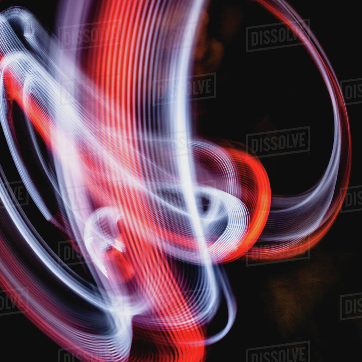 Abstract background with diffused tracks of bright red and white rays ...