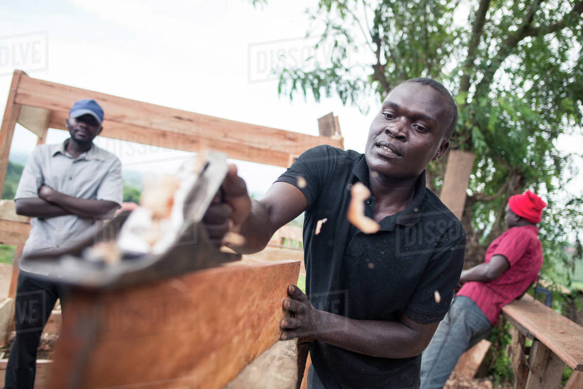 Uganda - November 26, 2016: Low angle of diligent attentive African ...