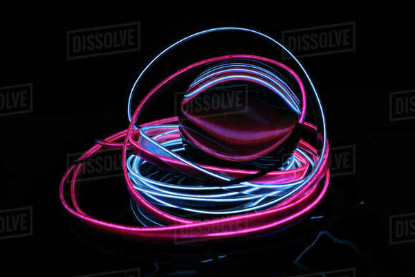 Neon ball wrapped in light tubes - Stock Photo - Dissolve