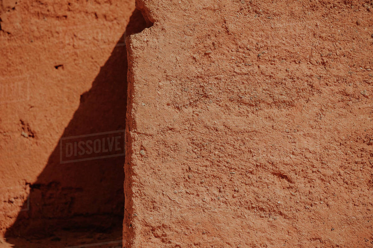 Exterior of aged traditional sandstone building with shabby walls and ...