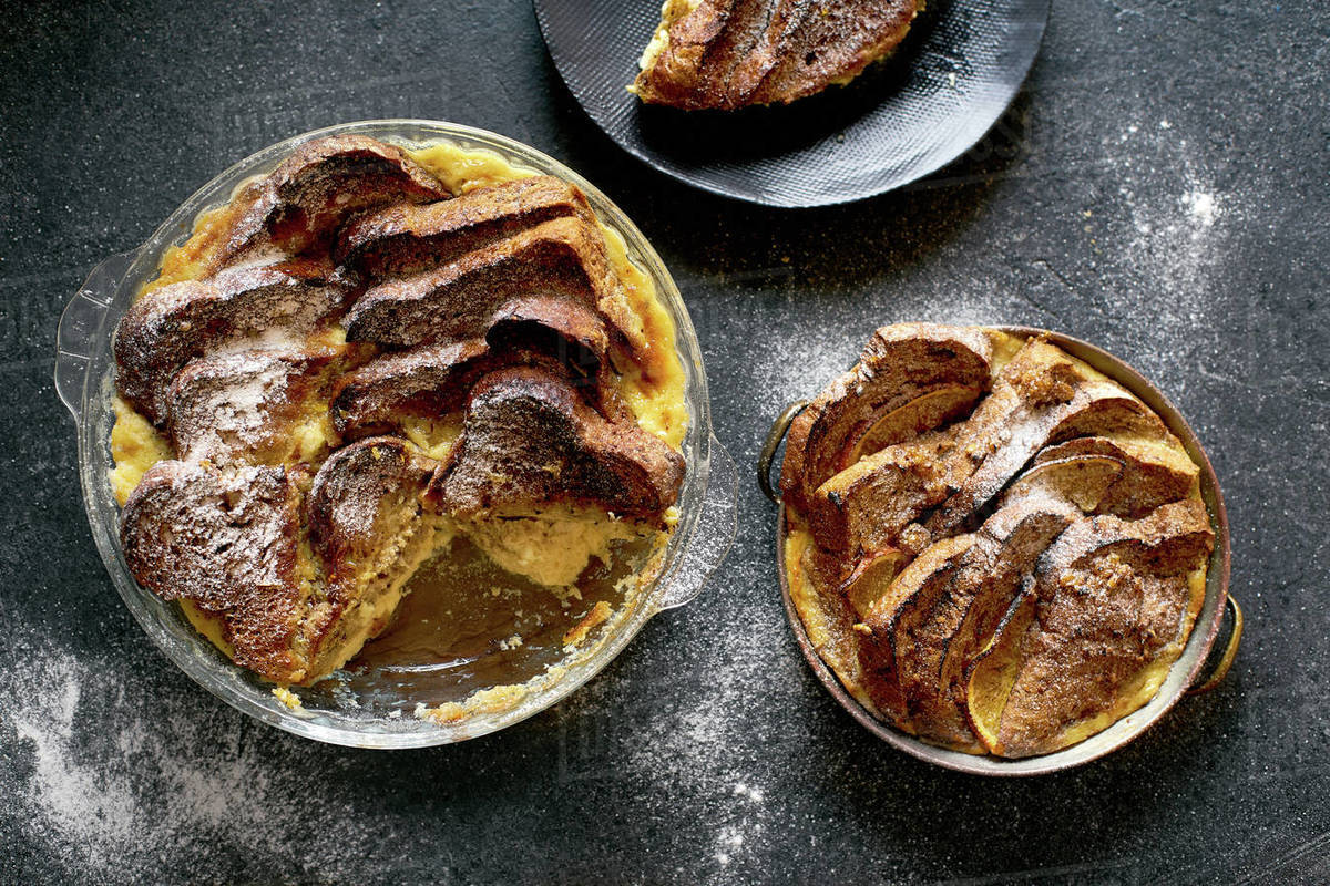 Top view of traditional bread pudding with custard, served with ...