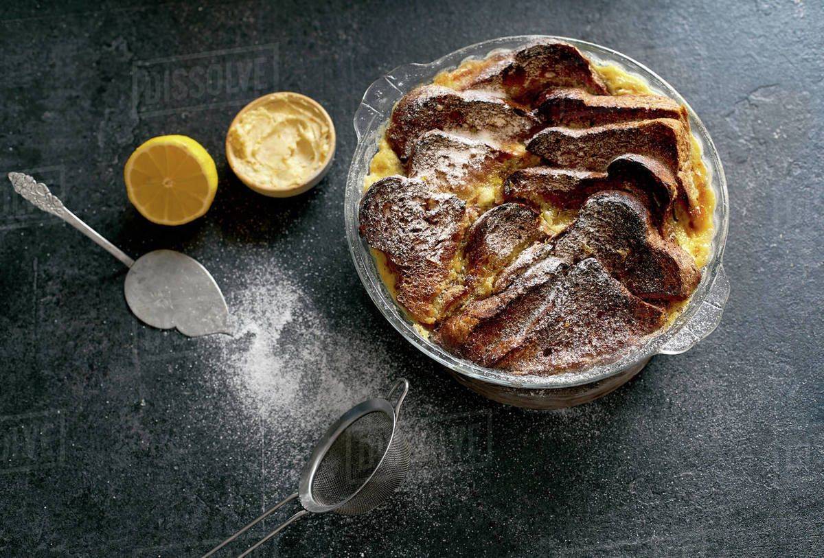 Top view of traditional bread pudding with custard, served with ...