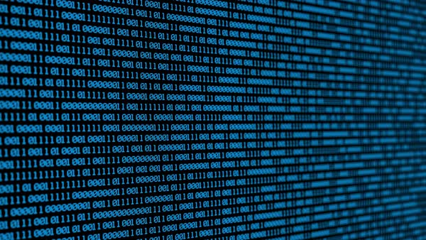 Close up blue binary code on black background. Futuristic cyberspace ...