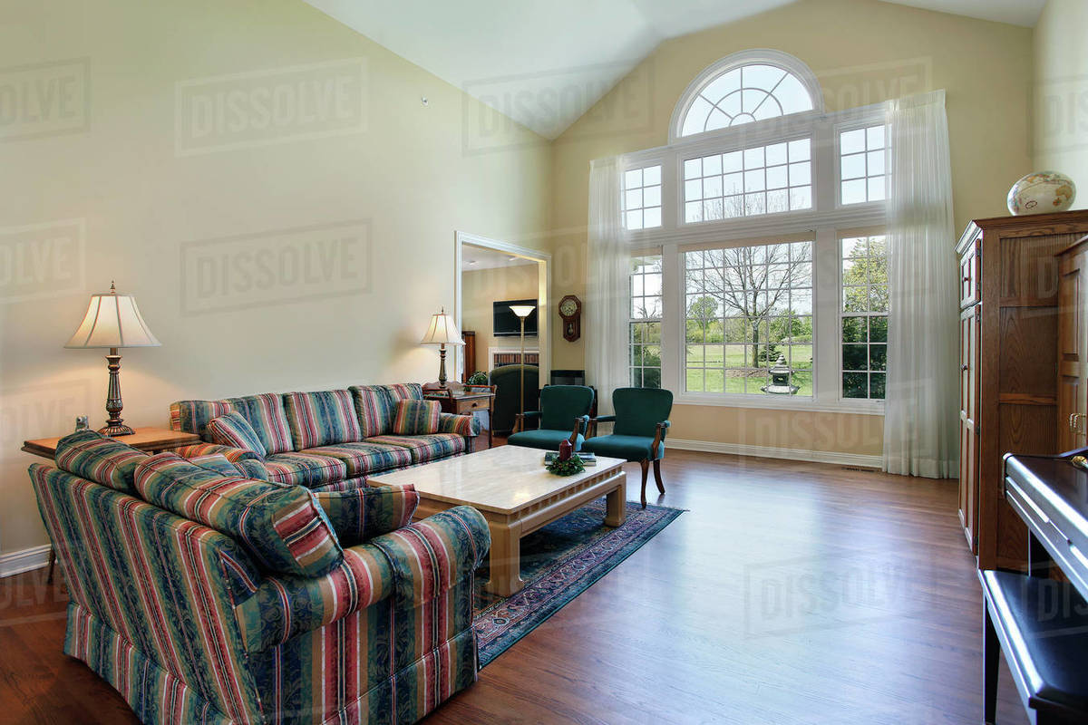 Living room in suburban home with hardwood flooring - Royalty-free ...