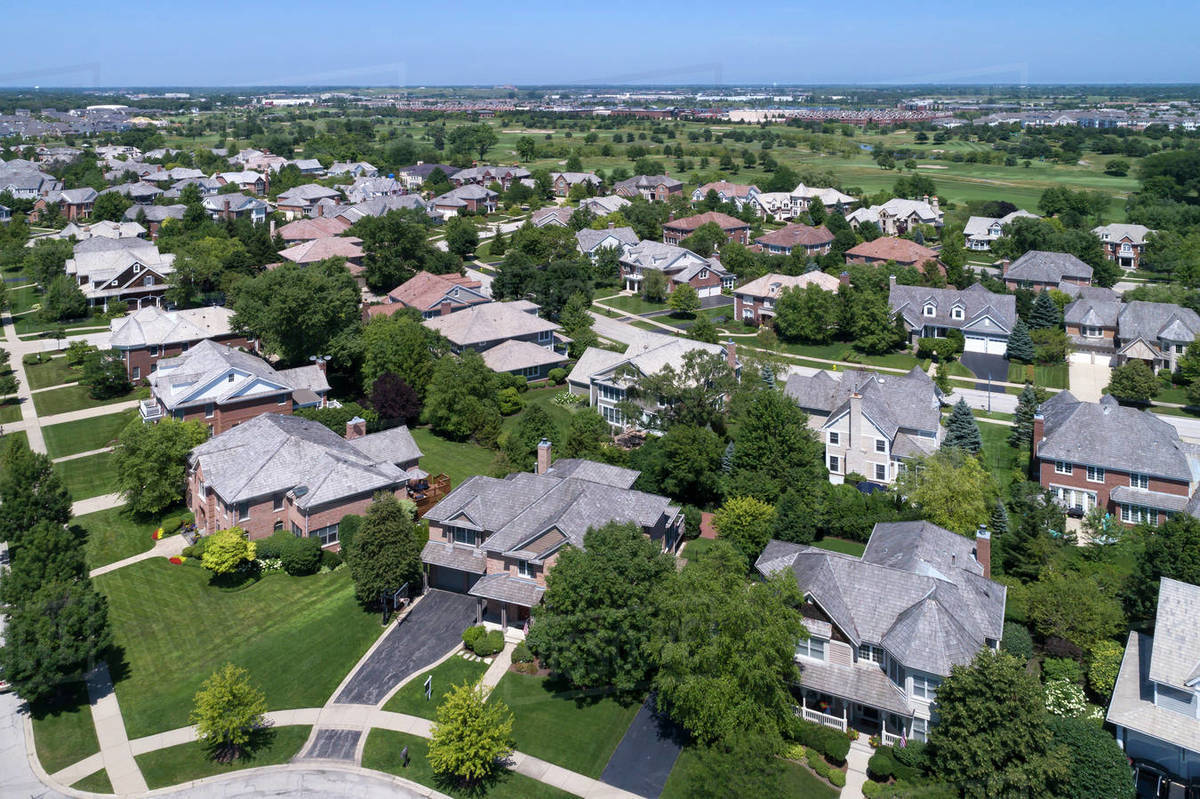 Aerial view of a neighborhood in suburban Chicago during summer with a ...