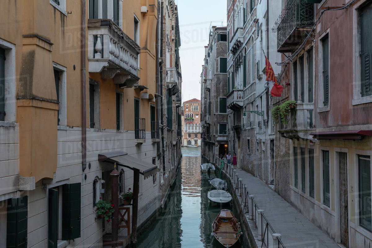 Panoramic view of Venice canal with historical buildings and gondolas ...