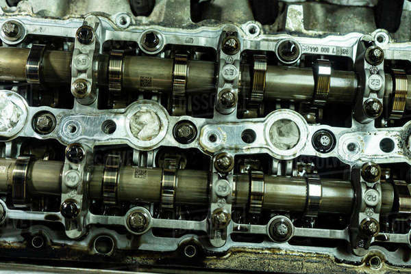 Detail of Car engine camshafts disassembled for maintenance. - Stock ...