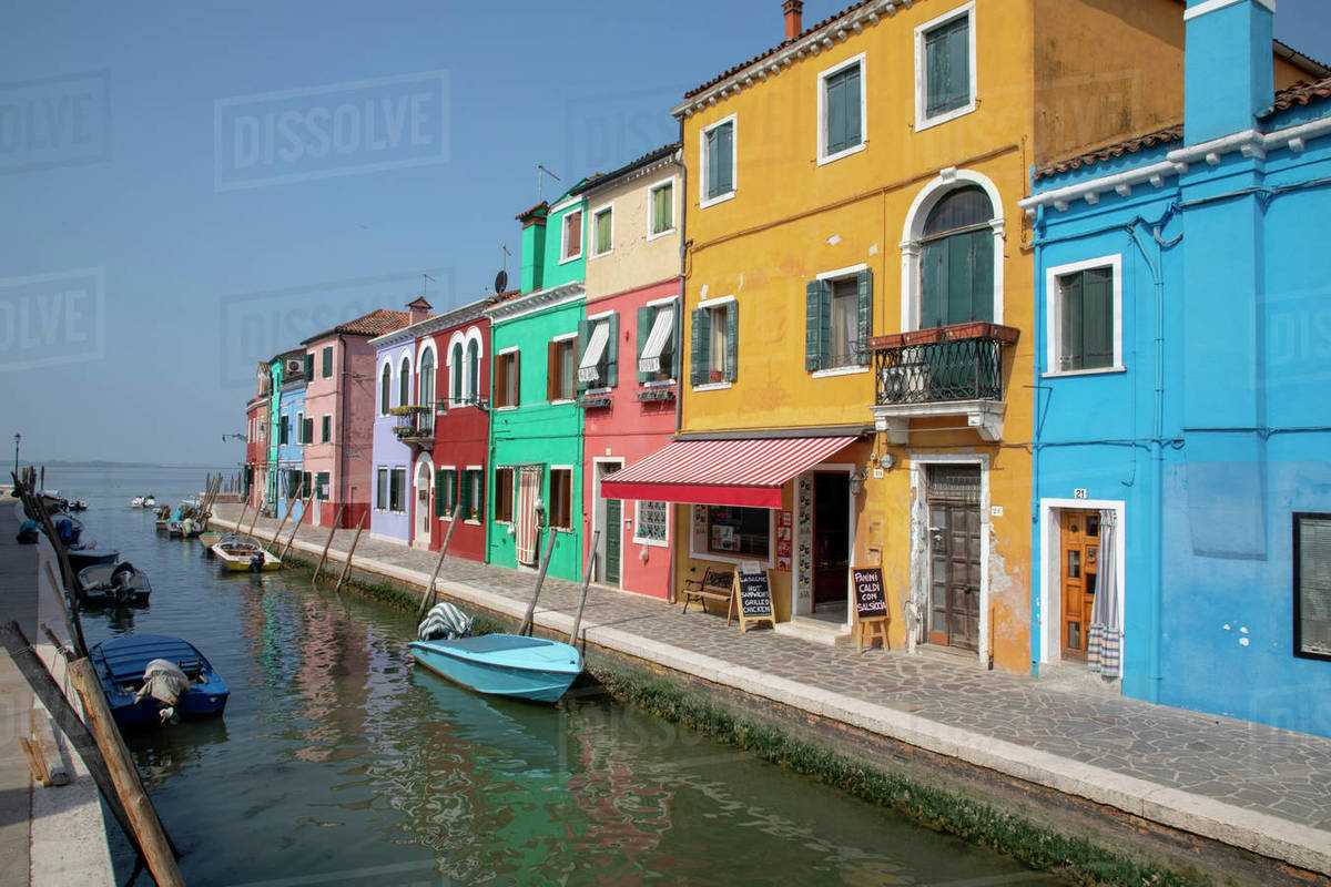 Colorful buildings on canal in Burano, Italy, Europe - Royalty-free ...