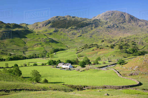 View across valley floor to Fell Foot Farm and Wetherlam, Little ...