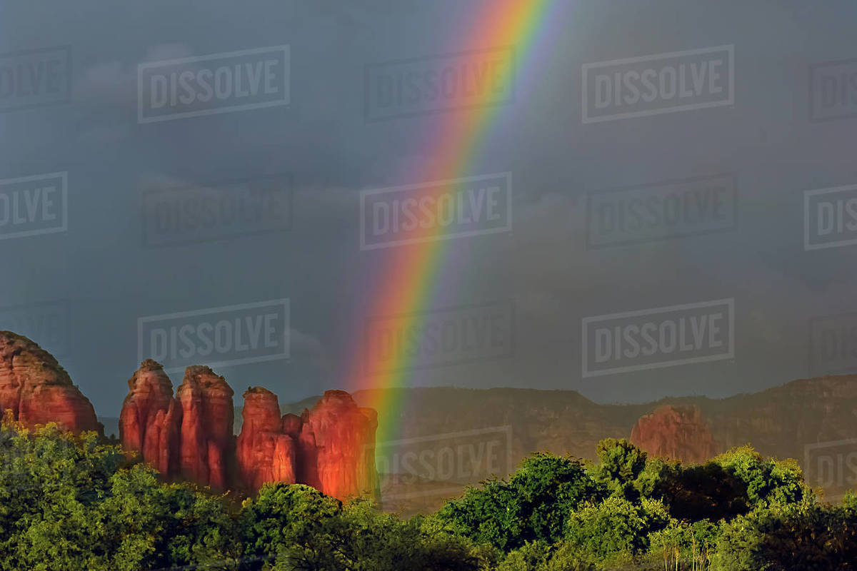 A purely accidental photo of a rainbow intersecting Coffee Pot Rock in ...