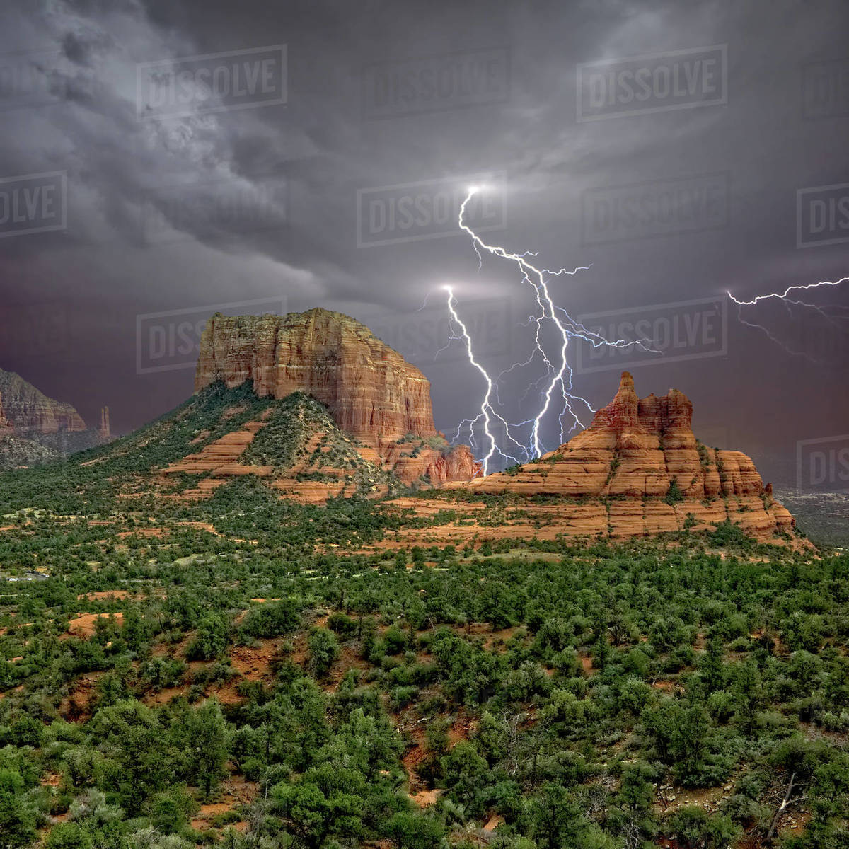 Lightning striking in between Courthouse Butte and Bell Rock near ...