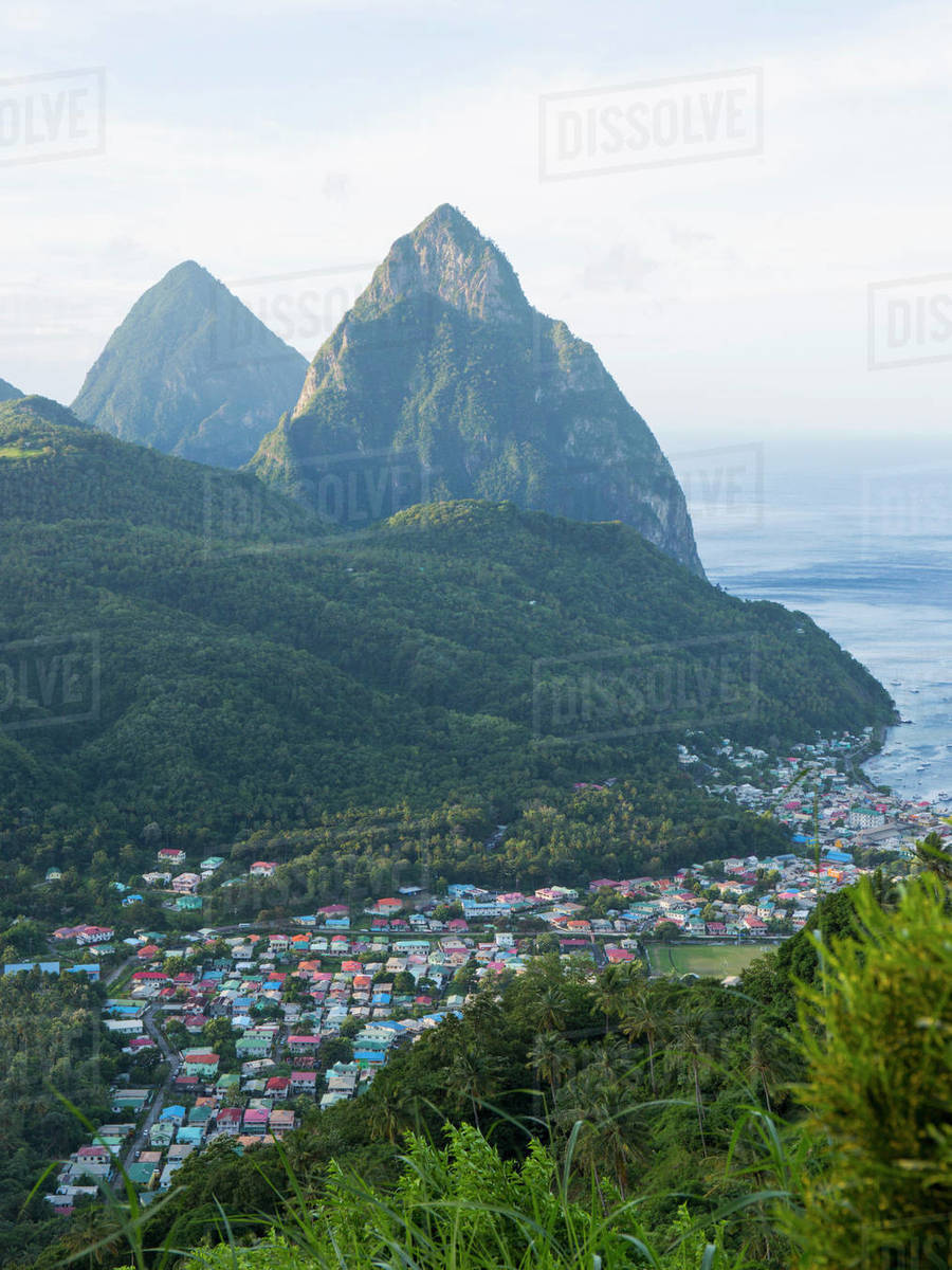 View to the Pitons, UNESCO World Heritage Site, from hillside above the ...