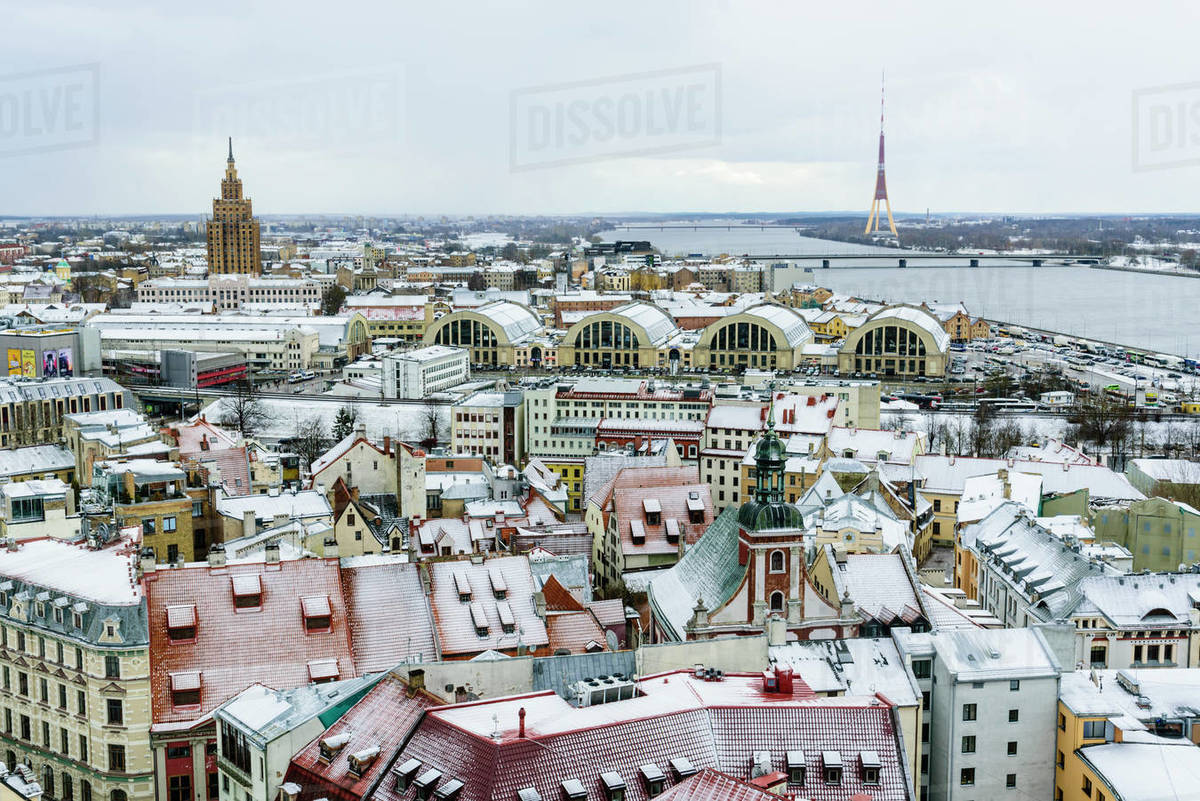 View over Riga Old Town city centre and Daugava River, with snow ...