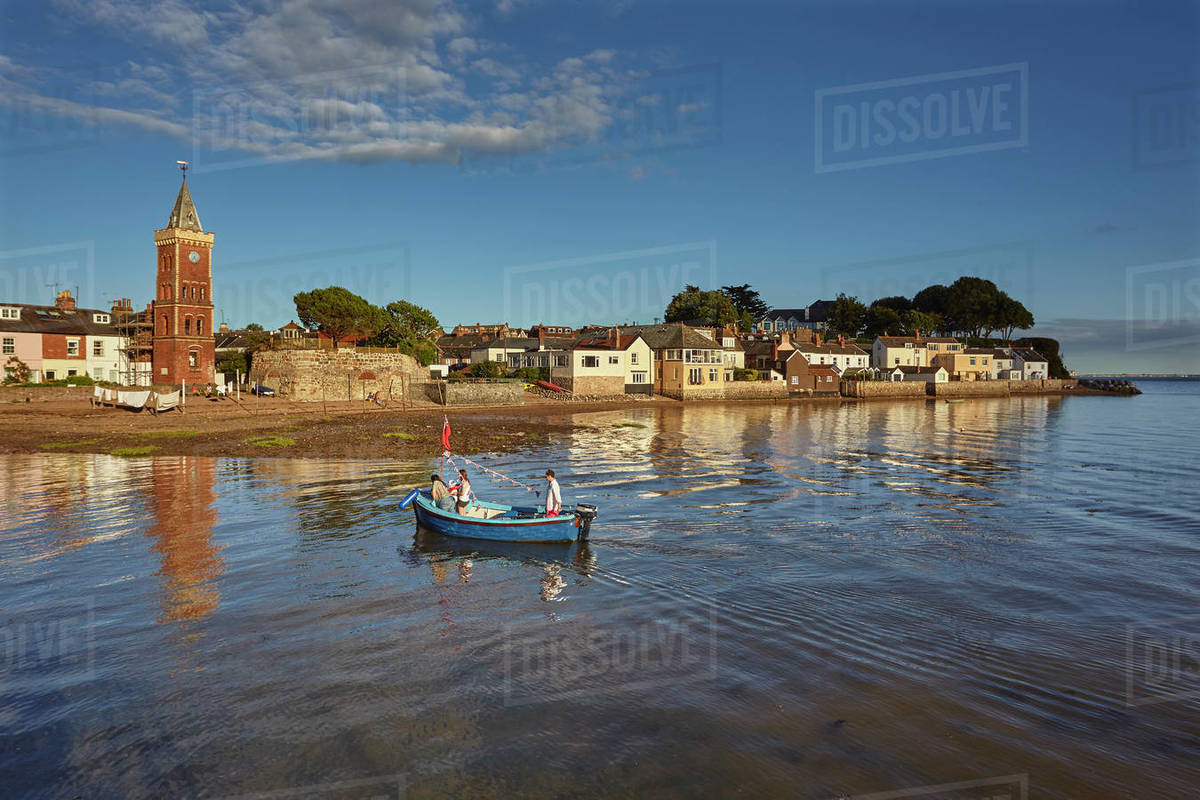 Evening sunlight on the historic Devon riverside village of Lympstone ...