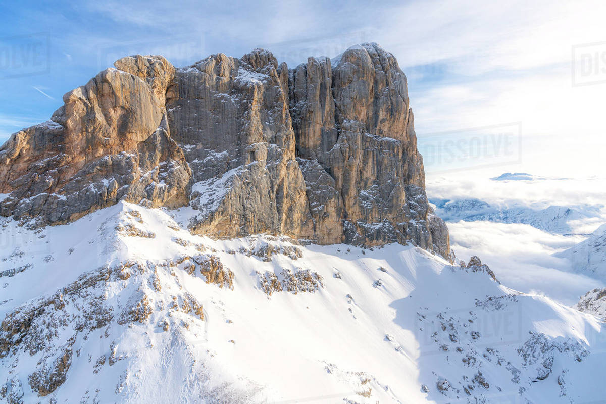 Aerial view of west ridge and south face of Punta Penia in winter ...