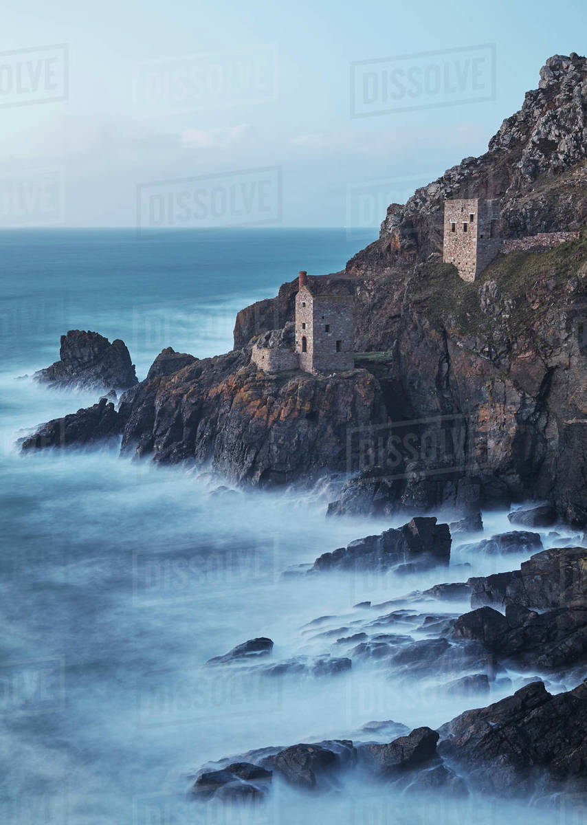 A dusk view of the iconic cliffside ruins of Botallack tin mine, UNESCO ...