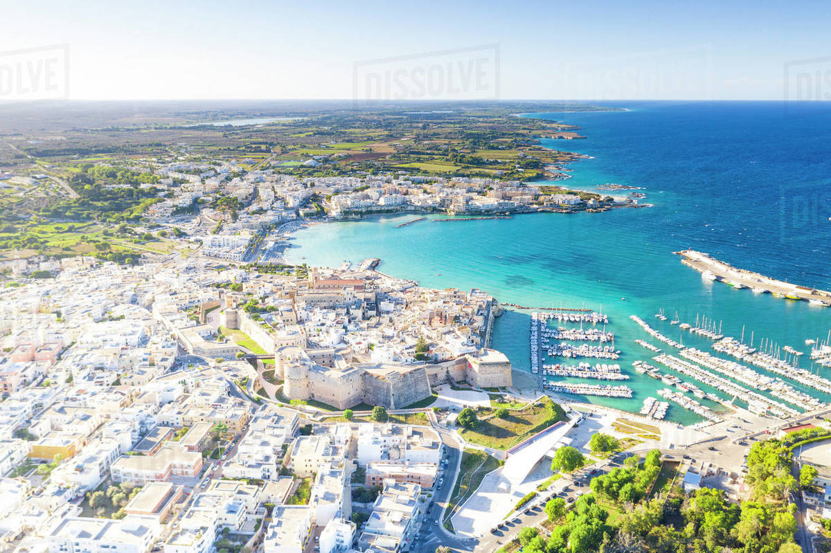 Aerial view of the coastal town of Otranto washed by the turquoise sea ...