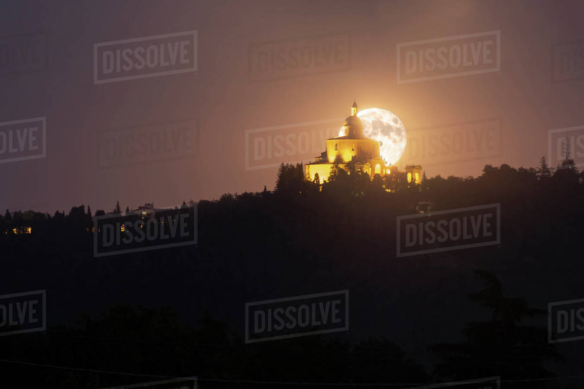 Full moon rising behind San Luca Basilica in Bologna, Emilia Romagna ...