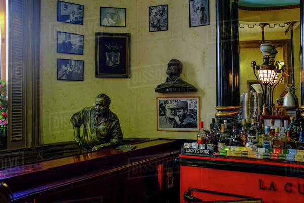 Sculpture of Ernest Hemingway sitting at the bar of the Floridita ...