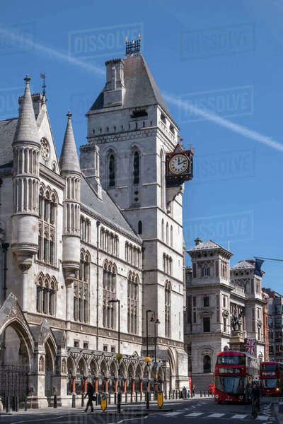 The Royal Courts of Justice, Central Civil Court, and red London bus on ...