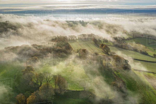Misty autumn morning above Cadbury Castle Iron Age Hillfort, Cadbury ...