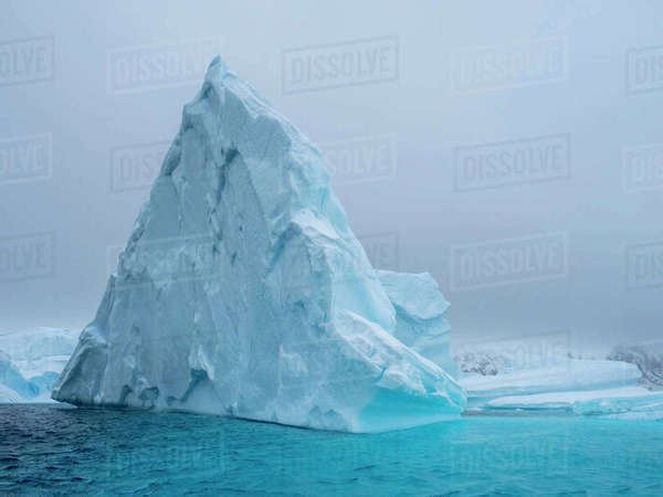 A huge iceberg grounded on a reef near the Iceberg Graveyard, Petermann ...