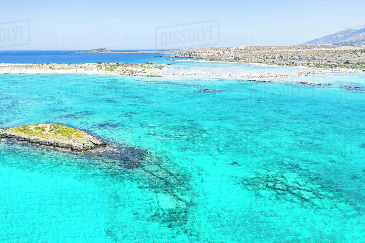 Aerial view of the blue sea surrounding Elafonisi beach, Crete island ...