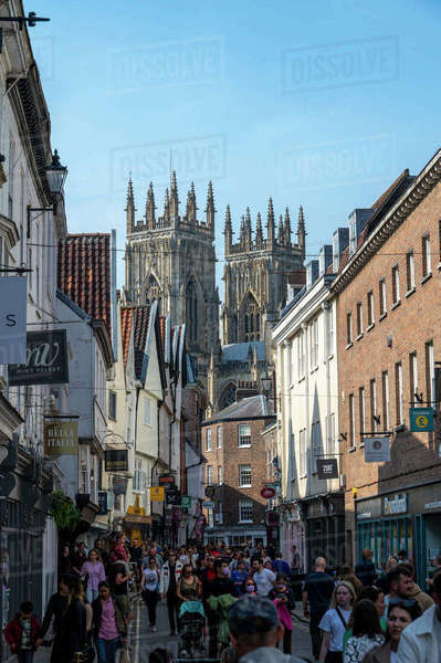 Tourists on street with view of York Minster, York, North Yorkshire ...