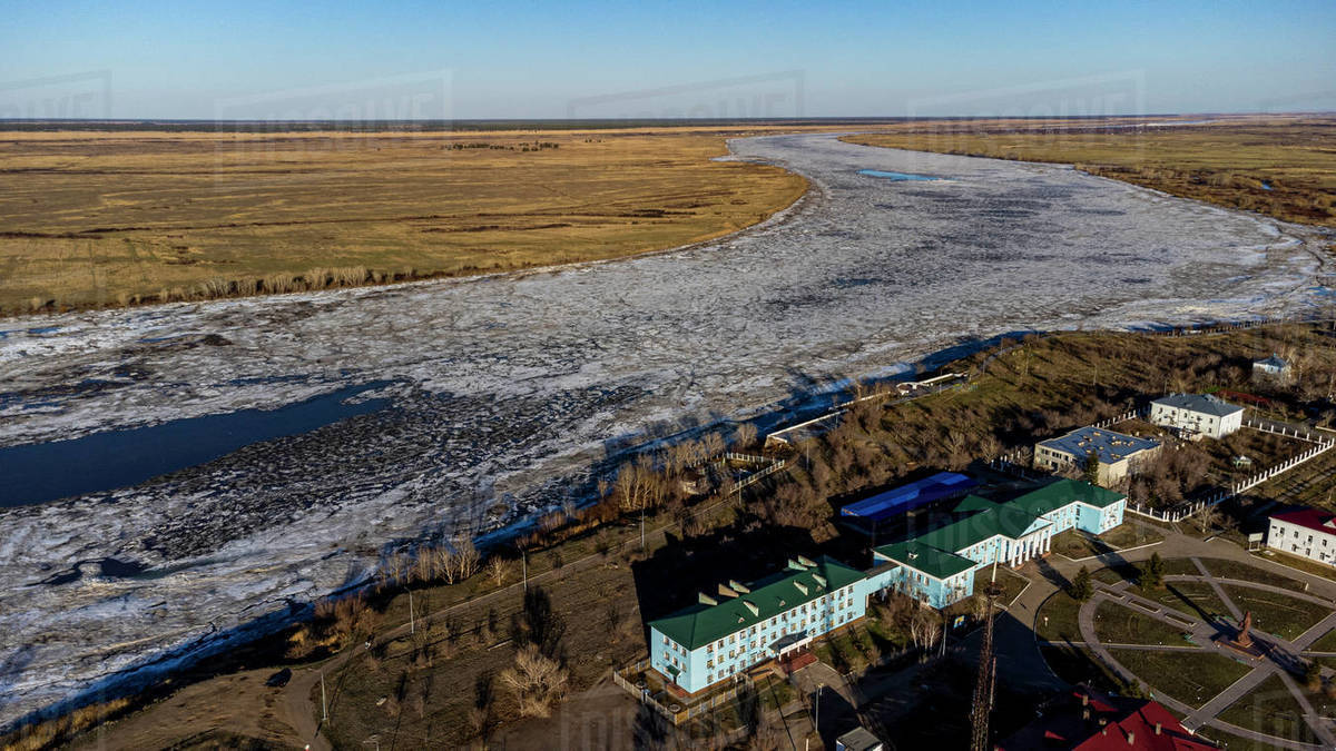 Aerial of Irtysh river, Kurchatov, fomer headquarters of the ...