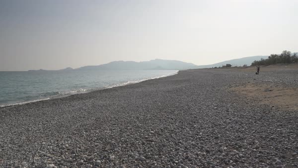 Paralia Massari Beach and Lindos in background, Rhodes, Dodecanese ...
