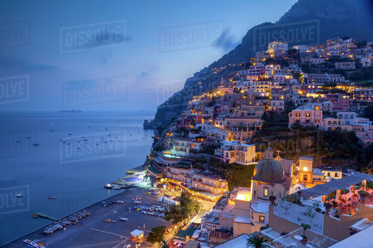Positano and beach at dusk, Amalfi Coast (Costiera Amalfitana), UNESCO ...