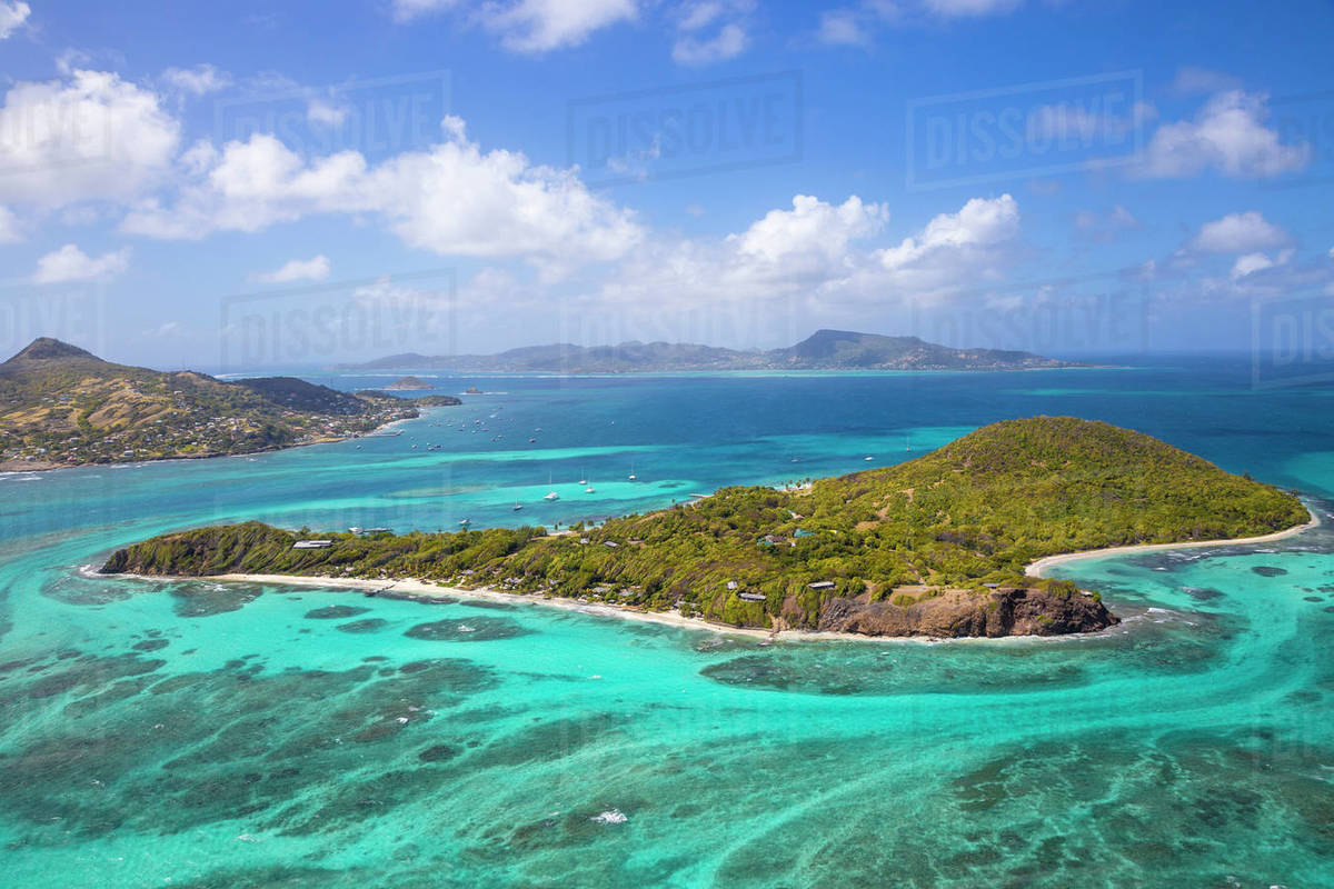 Aerial view of Petit St. Vincent, with Petite Martinique to the left ...