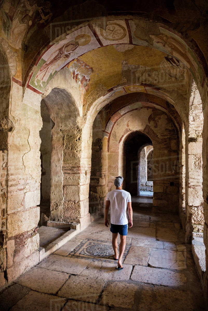 Tourist at ancient ruins of St. Nicholas Church, Antalya Province ...