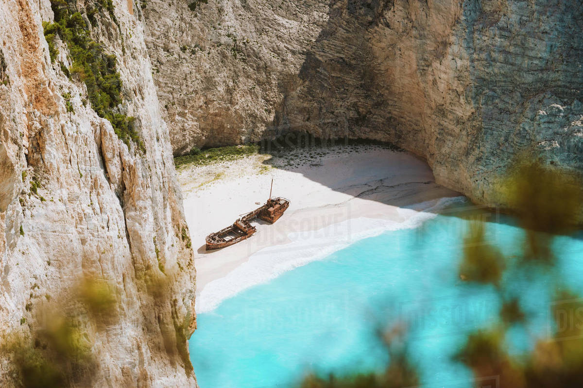 Close up of Navagio beach called Shipwreck bay. Turquoise water and ...