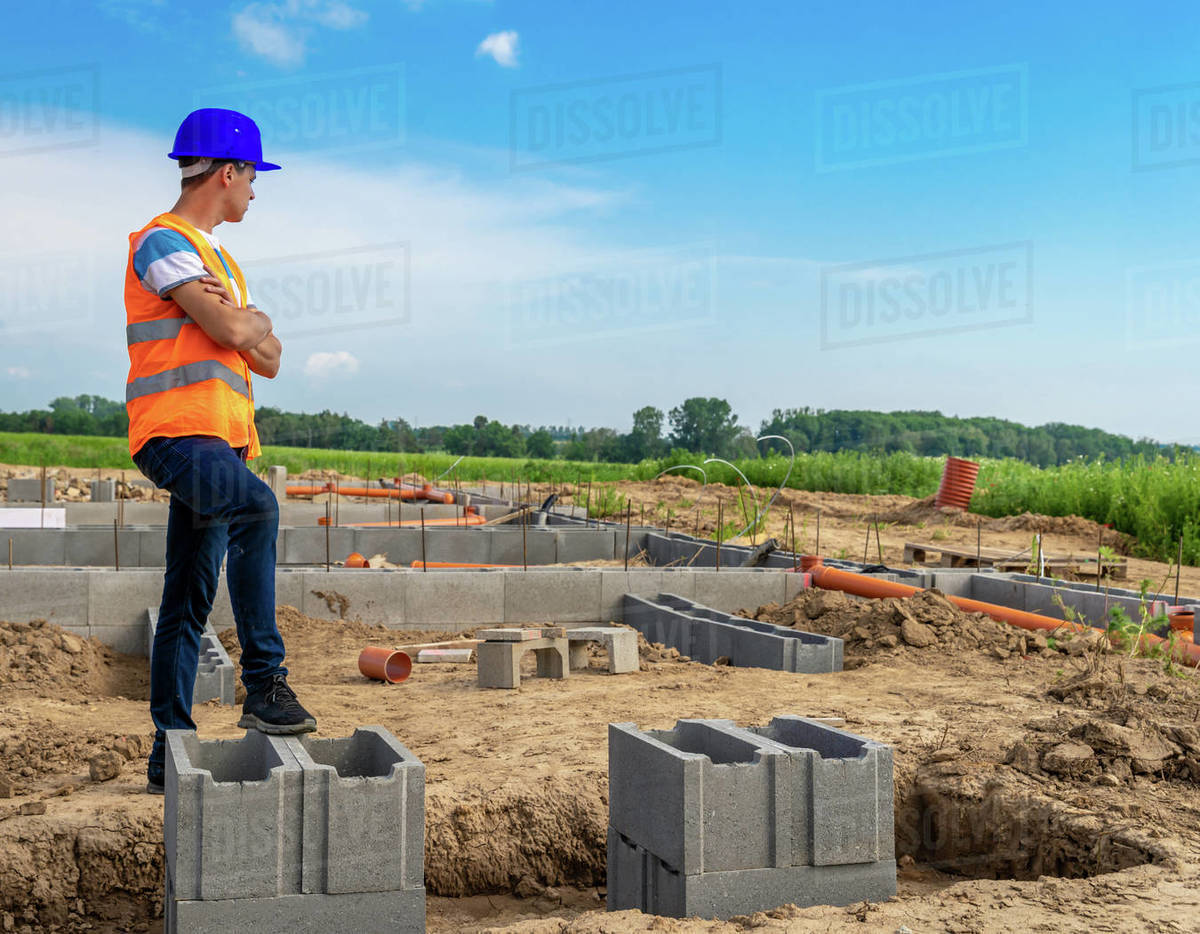 engineer on the construction of foundations of the building - Stock ...