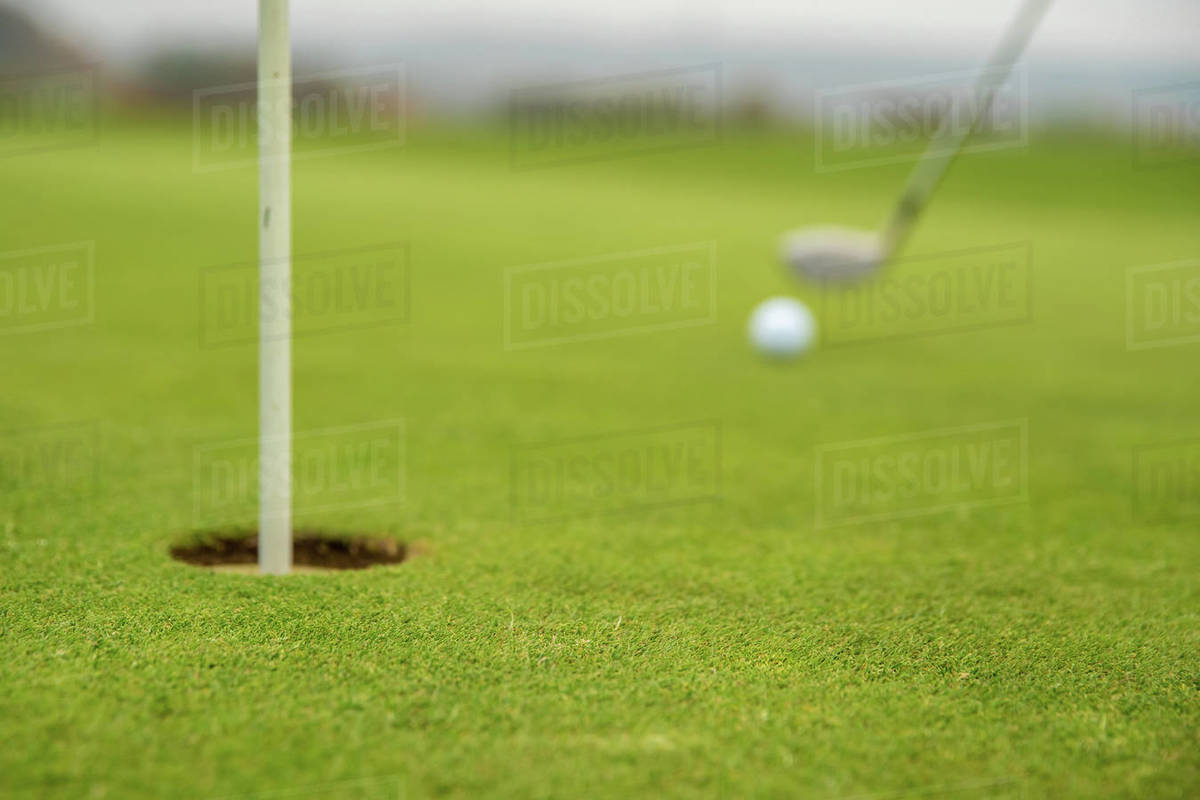 golf ball on the golf course before hitting the pit. - Royalty-free ...