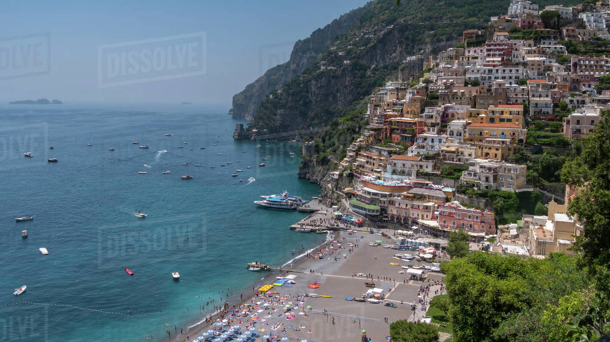 positano beach on the amalfi coast in southern italy on a summer's day ...
