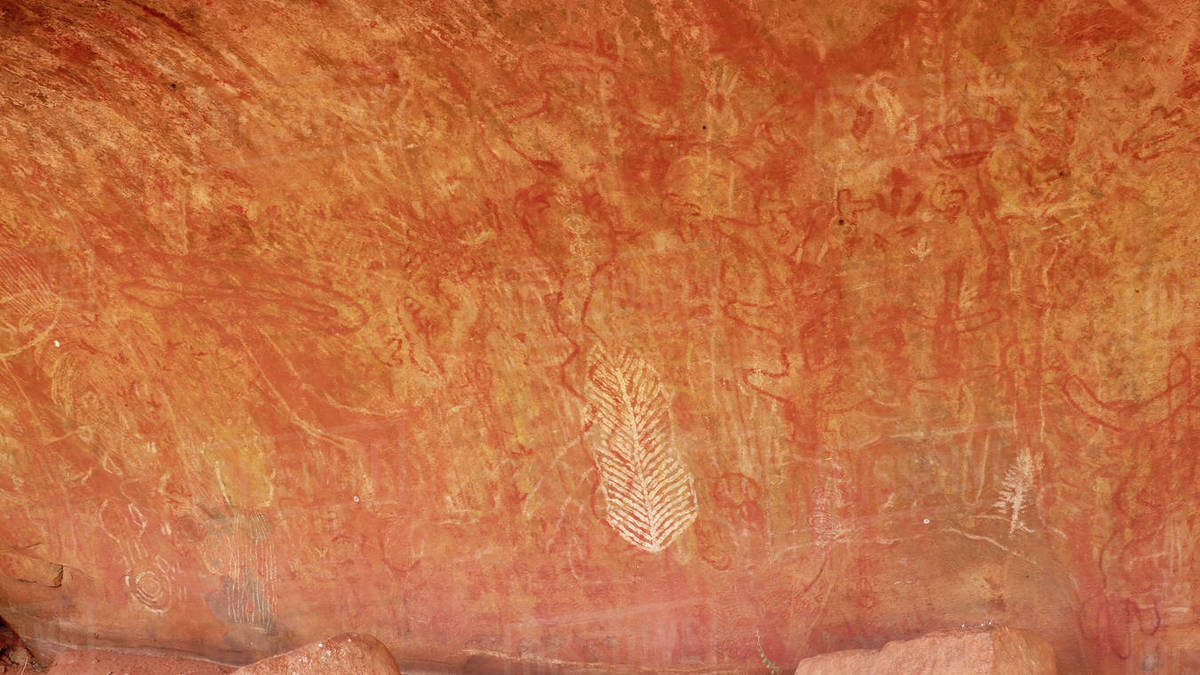 YULARA, AUSTRALIA - rock art in the boy's teaching cave of uluru at ...