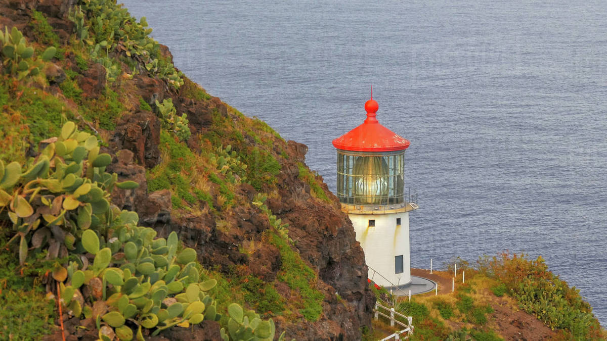 makapuu lighthouse on the hawaiian island of oahu at sunset - Royalty ...