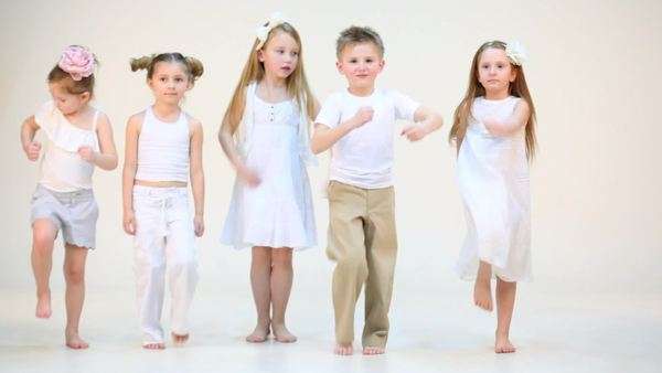 Five cute children marching on the spot isolated on white - Stock Video ...