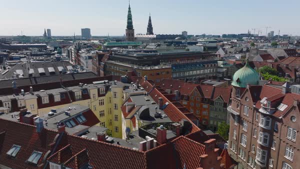 High angle view of buildings in historic city centre, tilt up reveal of ...