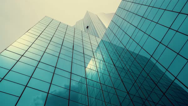 Time lapse of modern high-rise office building looking up from ground ...
