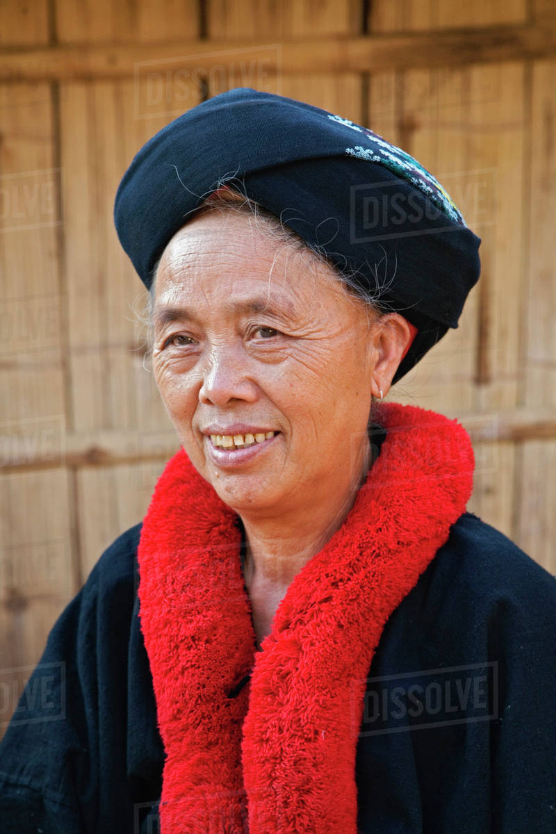 Lu-Mien or Yao hill tribe woman wearing traditional pom pom neck scarf ...