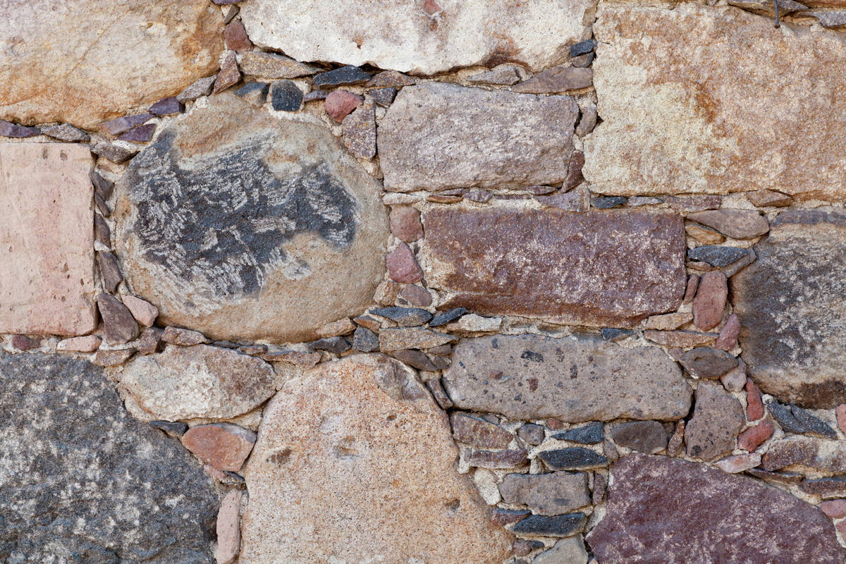 Mexico, San Miguel de Allende. Detail of traditional stone work on wall ...