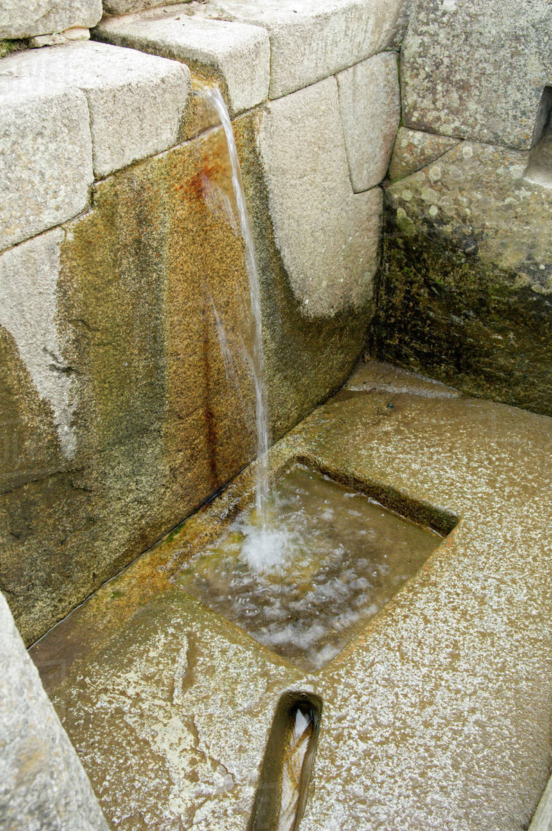 Peru, Machu Picchu, Fountain for domestic water supply. - Royalty-free ...