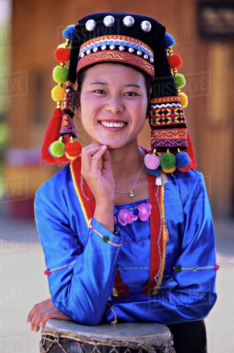 Asia, China, Yunnan Province. Young De'ang minority woman in ...