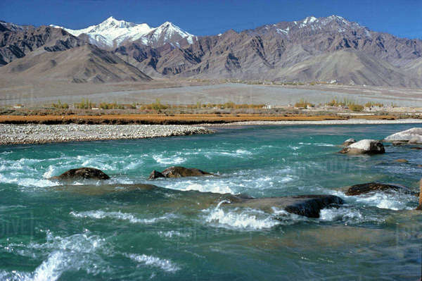 Asia, India, Ladakh, Indus River. The Indus River flows beside the ...